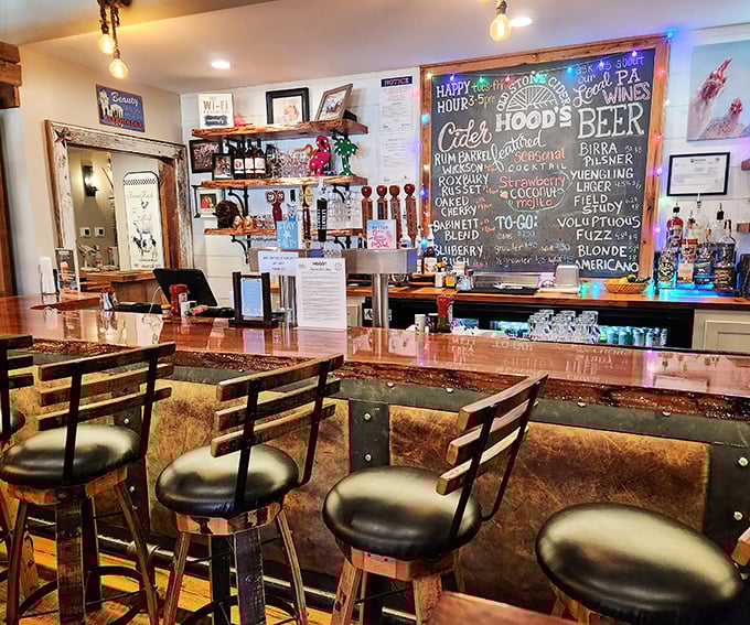 The bar at Hood's doesn't just serve drinks—it creates liquid companions for your barbecue journey, with a chalkboard of possibilities that reads like poetry.