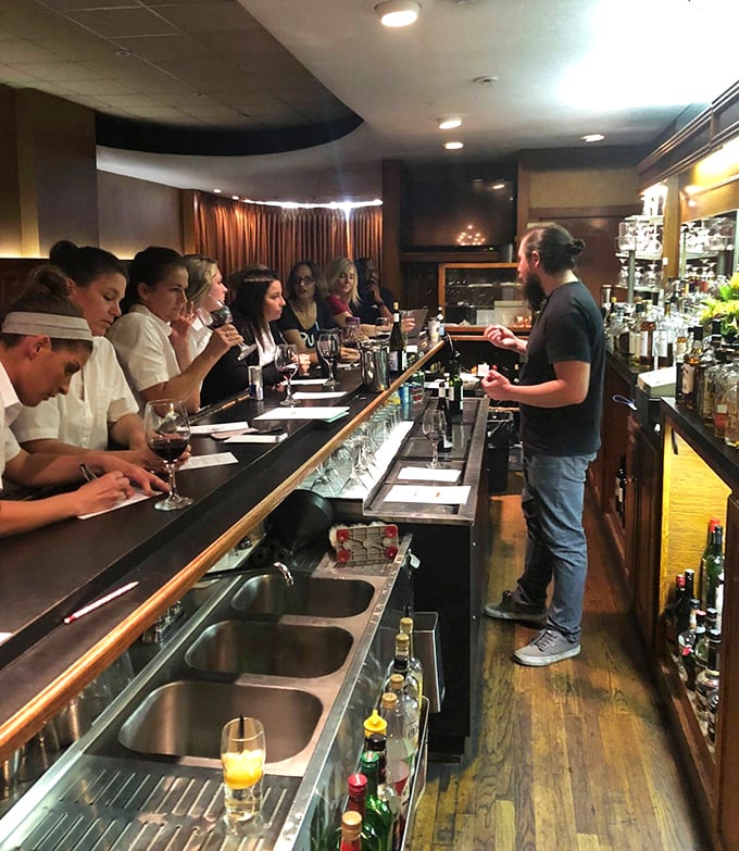 The bar where martinis are stirred with precision and stories are shared freely. No mixology theatrics needed when you've mastered the classics.