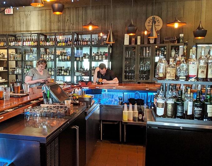 Behind this bar, bottles aren't just stored &ndash; they're showcased like the supporting characters in your evening's delicious story.