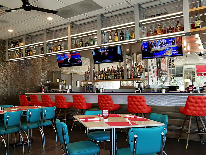 The bar doesn't just serve drinks &ndash; it showcases them like the Metropolitan Museum of Mixology, with red chairs inviting you to become a patron.