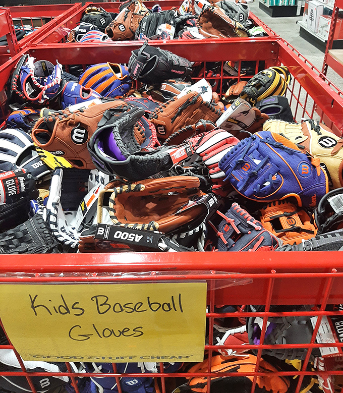 The baseball glove bin &ndash; a jumbled archaeological dig where future MLB stars and weekend warriors alike can unearth leather treasures at little league prices.