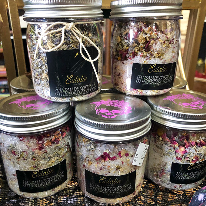 Mason jars filled with handmade bath salts from Eulalie—because sometimes self-care comes with a side of witchcraft and dried flower petals.