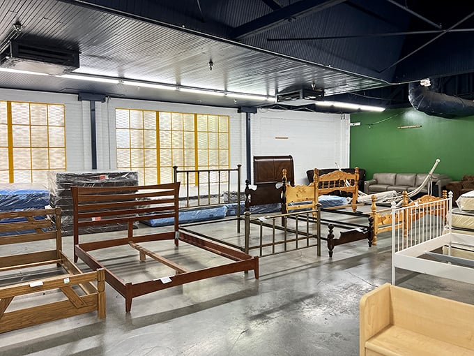 The bed frame showroom&mdash;where dreams of bedroom makeovers begin. That wooden headboard is practically begging to anchor your sleep sanctuary.