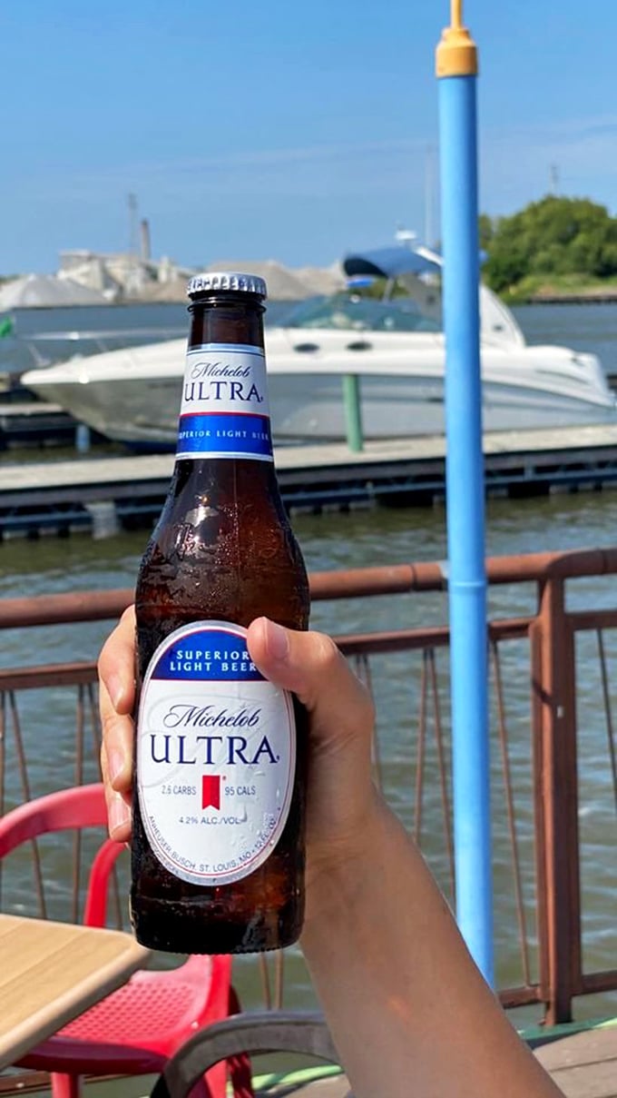 Nothing completes the waterfront dining experience like a cold beer with boats bobbing in the background &ndash; simple perfection.