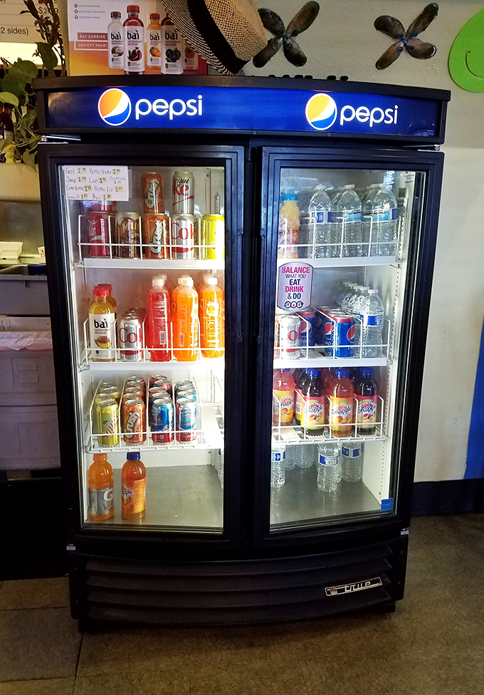 The beverage cooler stands ready with cold drinks to extinguish the thirst that inevitably follows a proper fish and chips feast.