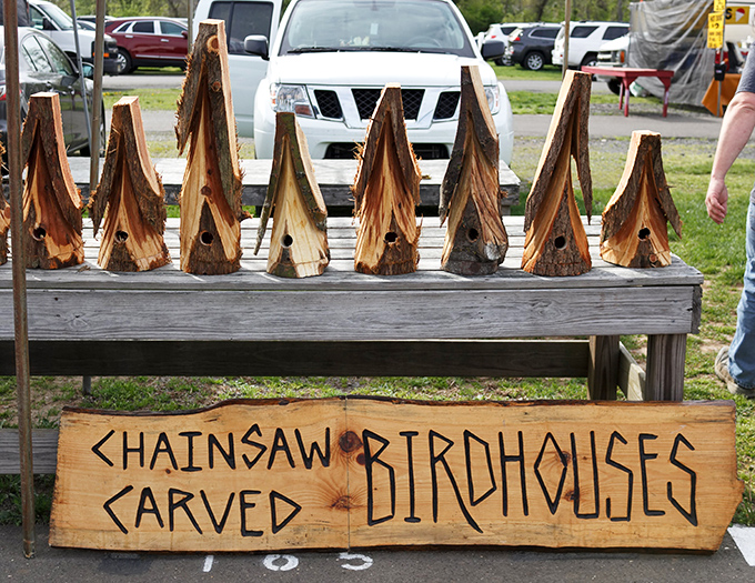 Chainsaw artistry transforms ordinary logs into avian real estate. These birdhouses bring rustic charm to any backyard sanctuary!