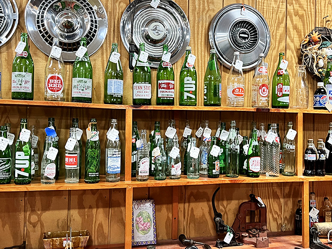Vintage soda bottles and hubcaps create an unexpected symphony of Americana &ndash; the kind of display that stops you mid-aisle.