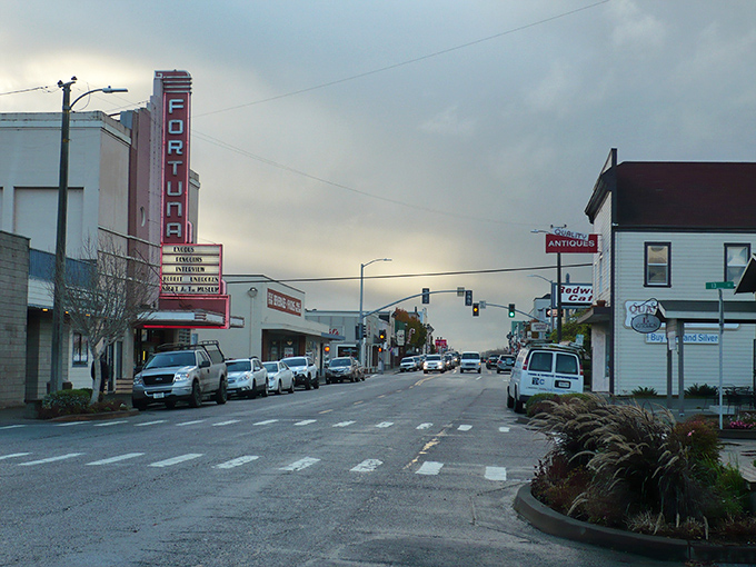 The historic Fortuna Theater's vertical sign stands as a beacon on Main Street, a reminder of simpler entertainment in our streaming era.