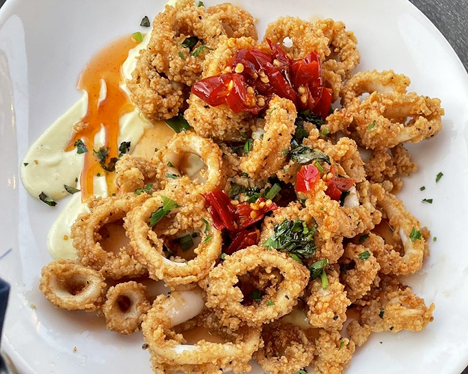 Calamari that defies the rubbery reputation of lesser versions. These golden rings are tender enough to cut with a fork&mdash;if you can resist using your fingers.