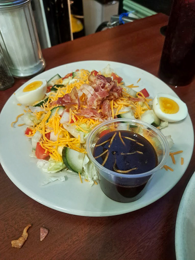 A chef salad loaded with fresh ingredients and hard-boiled eggs proves that healthy can still mean hearty and satisfying.