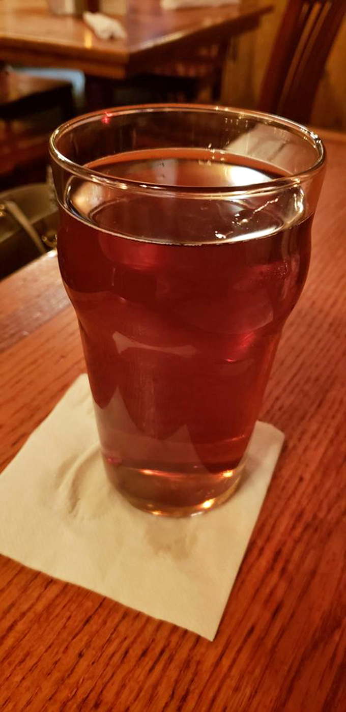 This isn't just beer; it's liquid amber that catches the light like a Pennsylvania sunset, promising refreshment with each sip.