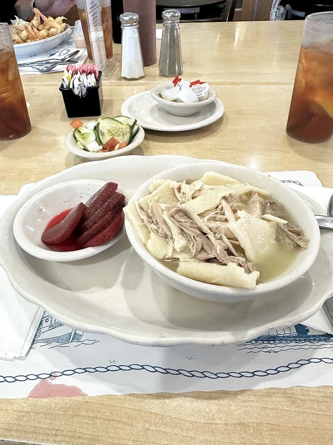 Chicken and dumplings with pickled beets on the side&mdash;proof that O'Steen's knows there's more to life than just seafood.