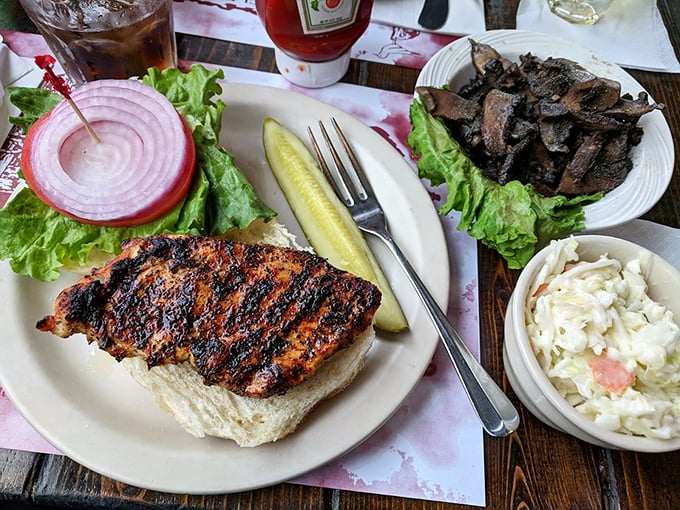 That chicken sandwich has char marks like a love letter written by the grill itself.