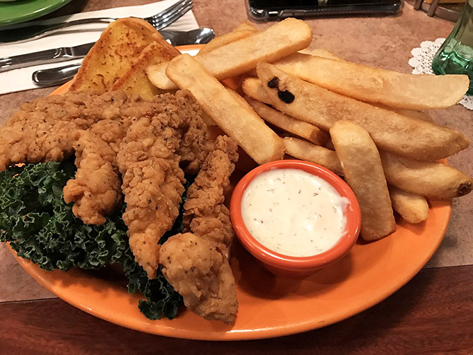 Chicken tenders that actually taste like chicken, not some mysterious pressed protein, served with a dipping sauce that demands to be introduced to everything on your plate.