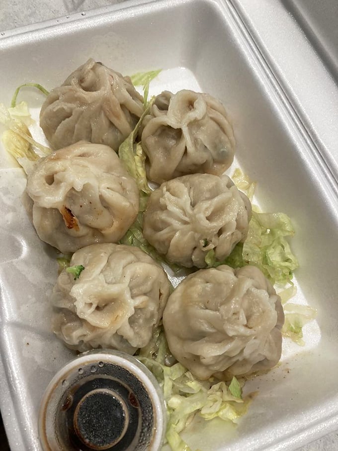 Delicate chive buns that whisper secrets of traditional cooking techniques with every tender bite.