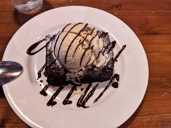 The brownie &agrave; la mode &ndash; a study in contrasts where warm chocolate decadence meets cold vanilla creaminess in a dessert that's worth every calorie.