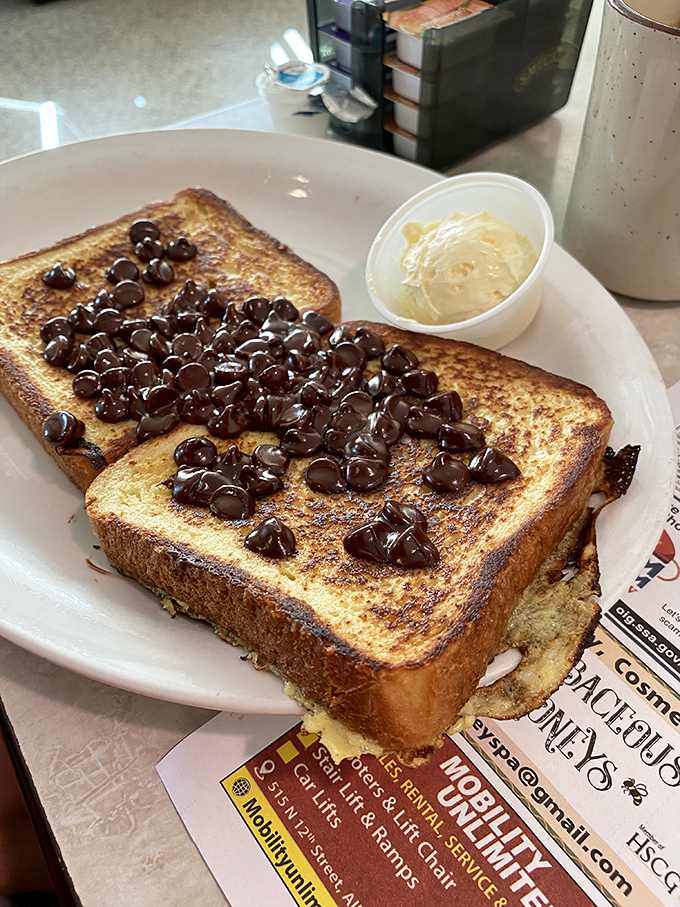 French toast that went to chocolate chip finishing school. With a side of cream that's not asking permission to be indulgent.