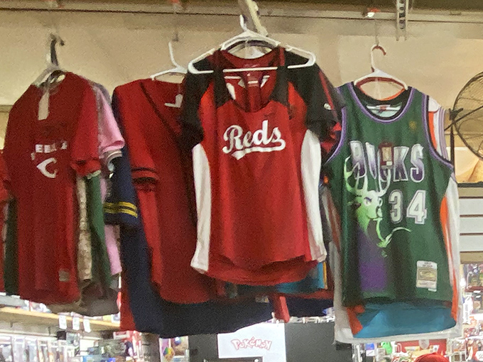 Cincinnati Reds and Celtics jerseys hanging side by side &ndash; a sports fan's paradise where team loyalty comes with a bargain price tag.