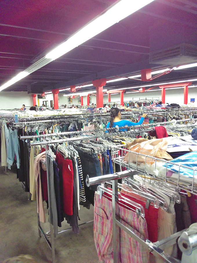 The clothing forest, where patient shoppers navigate racks of possibilities. Like panning for gold, the effort always pays off with unexpected denim diamonds.