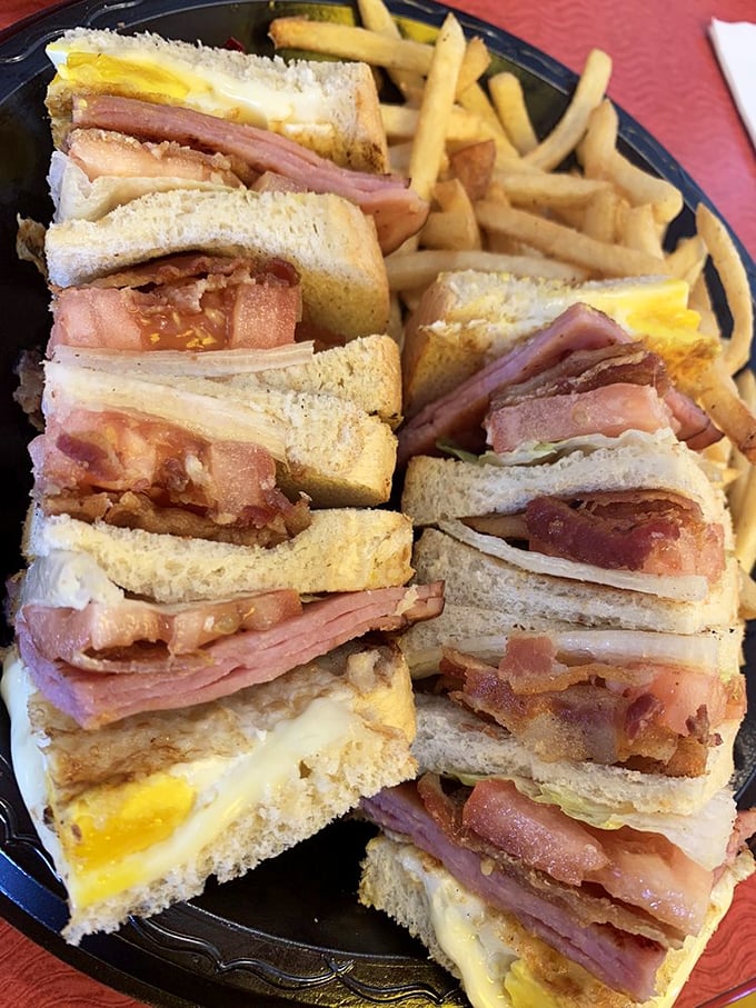 The club sandwich: three stories of breakfast brilliance that makes skyscrapers jealous of its perfect structural integrity.