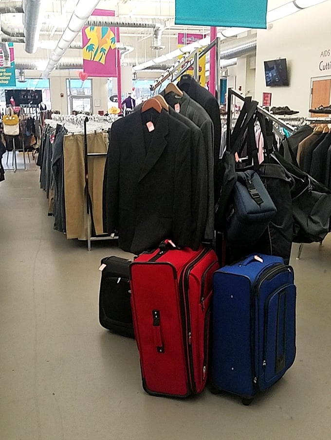 Business up top with suits and blazers, party on the bottom with colorful luggage&mdash;the mullet philosophy of thrift store organization.