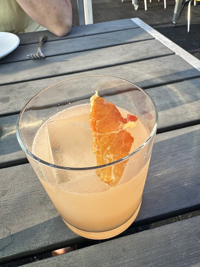 Sicily in a glass. This citrus-forward cocktail, garnished with fresh orange peel, captures Mediterranean sunshine even on cloudy Pennsylvania days.