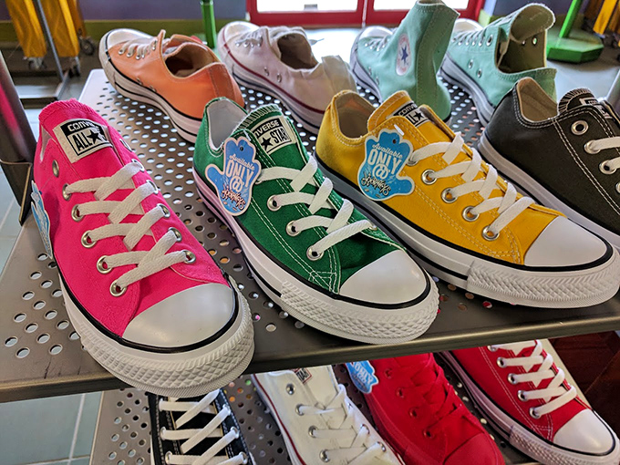 A rainbow of Converse sneakers standing at attention. Each color represents a different personality&mdash;which one matches yours?