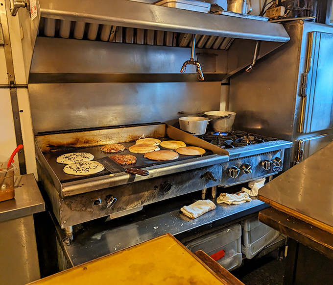 The tiny kitchen where breakfast dreams are born. On this griddle, pancakes achieve the perfect golden-brown that money can't buy.