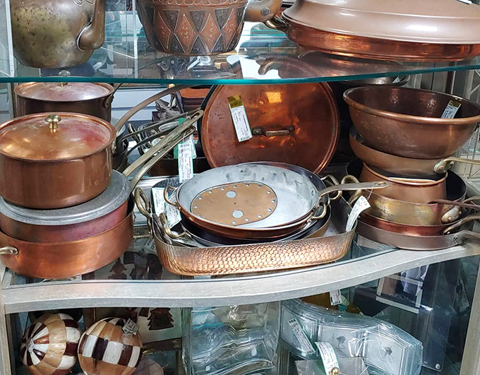 Copper cookware with the patina of countless family dinners. Julia Child would approve of these well-loved kitchen workhorses.
