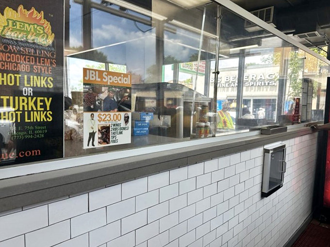 The ordering counter at Lem's is where dreams are placed and fulfilled, one sauce-soaked package at a time.