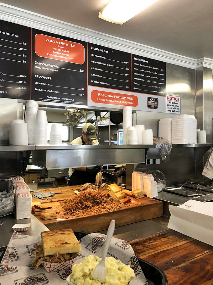 Behind the counter is where the magic happens&mdash;wood-chopped pork on display like the culinary treasure it is, ready for its close-up and your appetite.