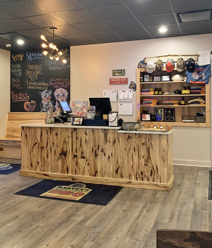The reception desk at barbecue heaven—complete with a chalkboard of specials and merchandise that lets you take the experience home.