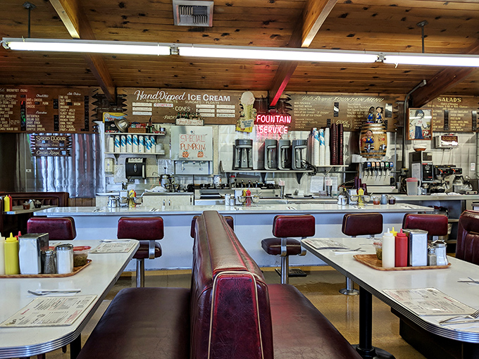 Counter seats with a view of the action, where the real show happens on that well-seasoned grill.