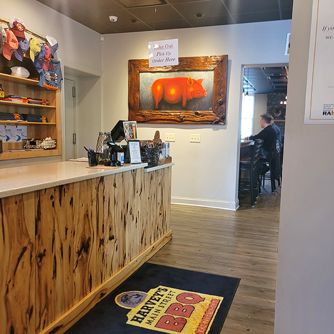 The counter where barbecue dreams come true. That pig painting isn't just decoration&mdash;it's a tribute to the star of the show.