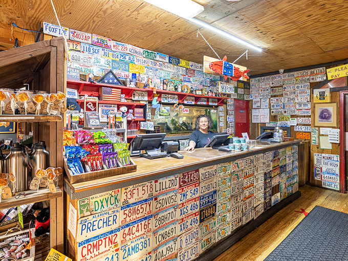 The license plate-covered counter isn't trendy d&eacute;cor&mdash;it's a visual guestbook of visitors who've made the pilgrimage for perfect catfish.
