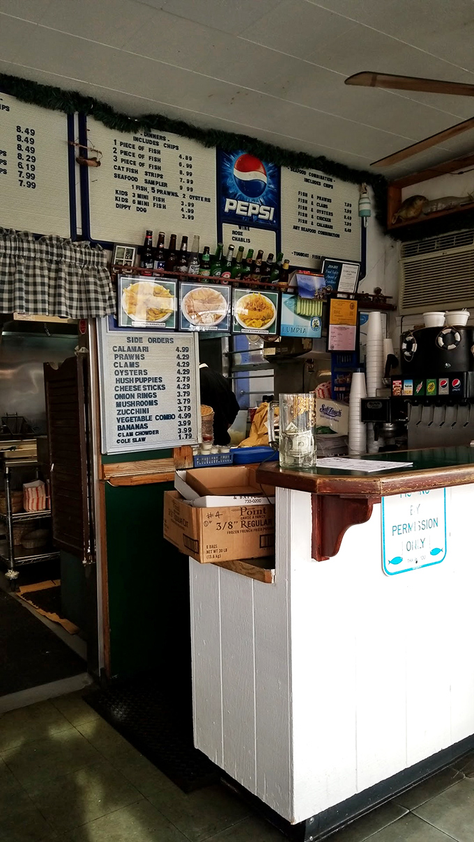 The ordering counter – where dreams come true and diets go to die. Those menu photos aren't just pictures; they're promises of happiness.