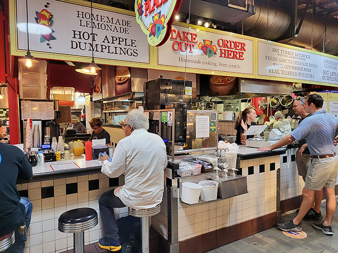The counter service setup showcases efficiency in motion&mdash;staff working with the choreographed precision of a well-rehearsed dance company.