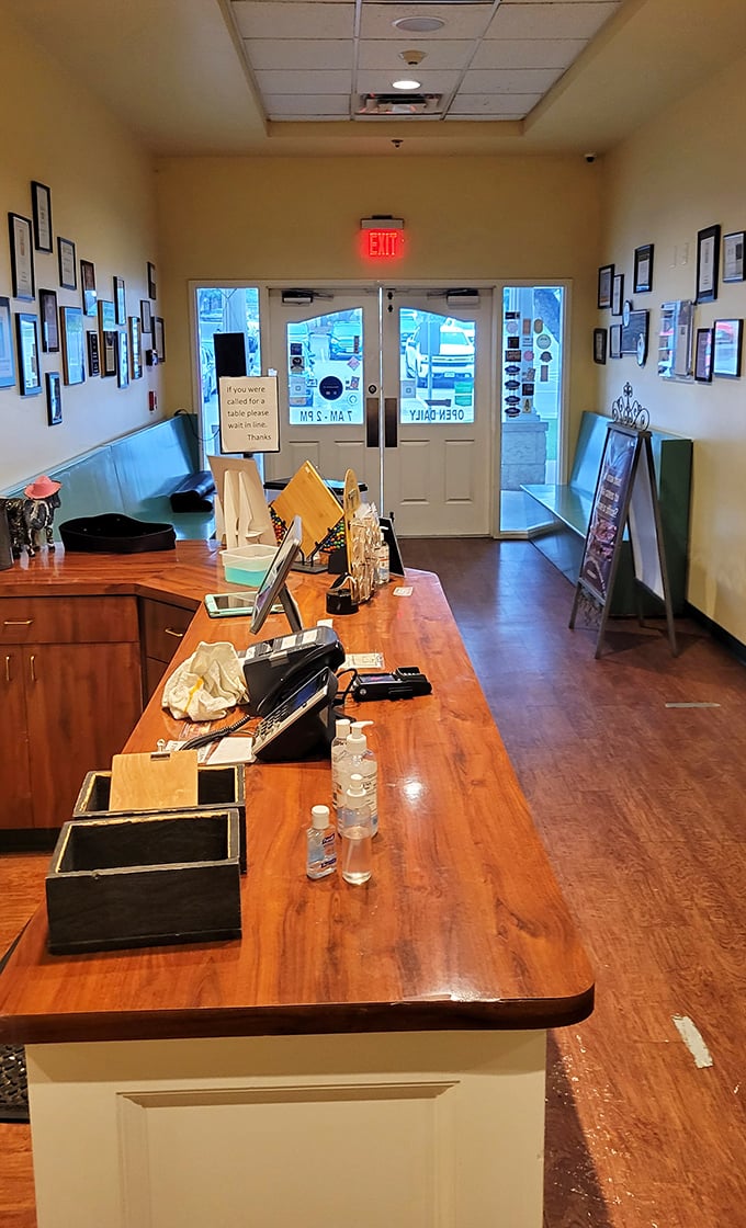 The host stand welcomes you to pancake nirvana—where the only acceptable response is "Yes, I'd like a table for immediate happiness."