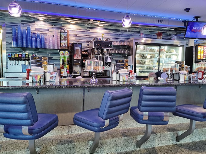 Counter seating: where solo diners become regulars and regulars become family. The blue swivel chairs have witnessed more local news than the town newspaper.