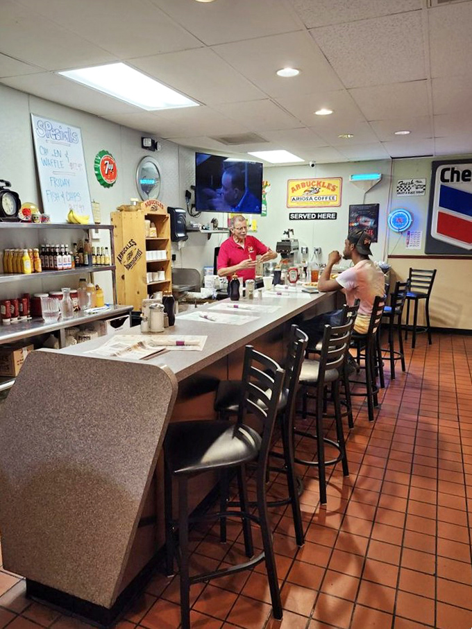 The counter seating offers front-row views of short-order choreography, where servers and cooks perform a well-rehearsed breakfast ballet.