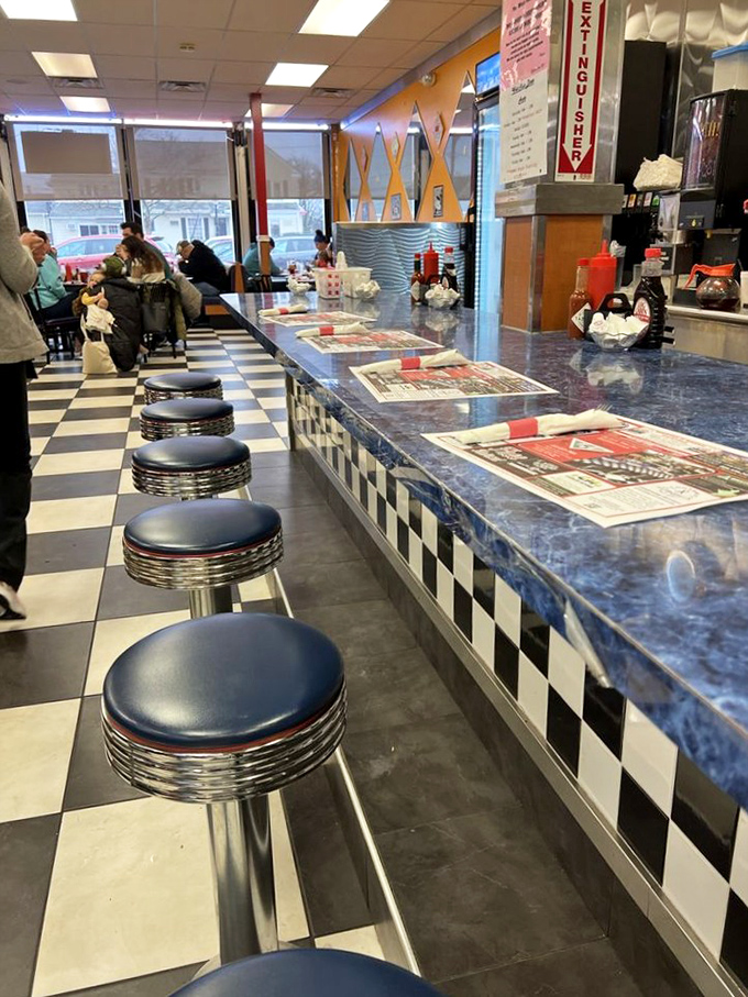 Counter culture at its finest&mdash;where newspapers meet coffee cups and strangers become temporary breakfast companions united by hunger.