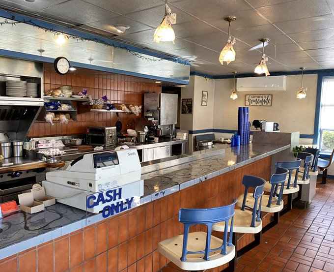 The blue counter stools &ndash; where strangers become friends over coffee and where breakfast philosophies are exchanged daily.