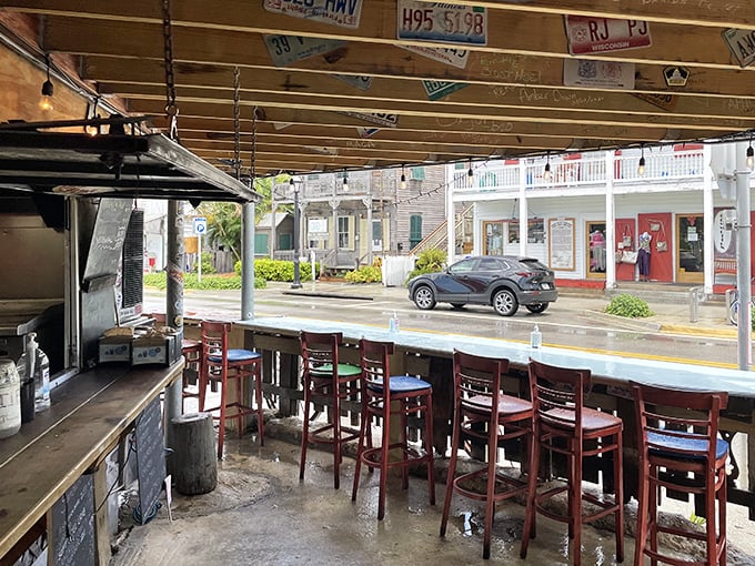 Bar seating with a view of Key West life. Where strangers become friends over the shared religion of fresh seafood.