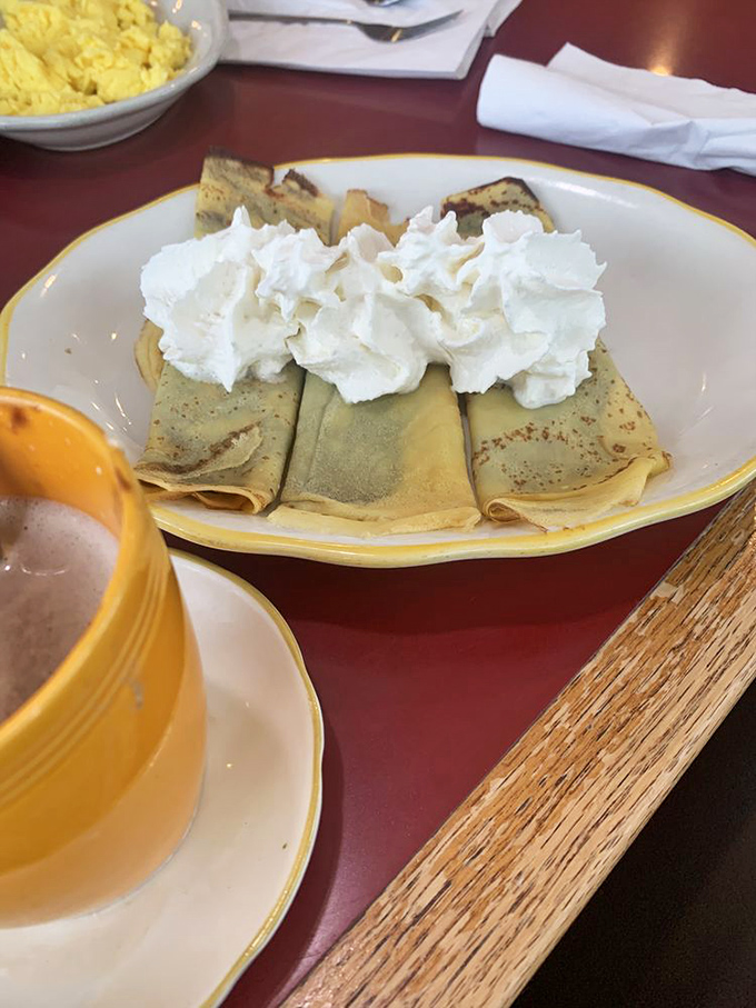 Delicate crepes with a cloud of whipped cream &ndash; the breakfast equivalent of wearing silk pajamas while watching sunrise.