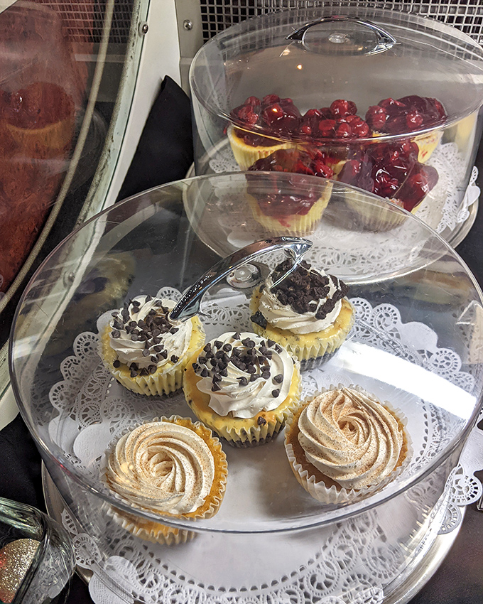 These cupcakes aren't just waiting to be eaten—they're posing on lace doilies like they're at a fancy dessert prom, and they're all competing for queen.