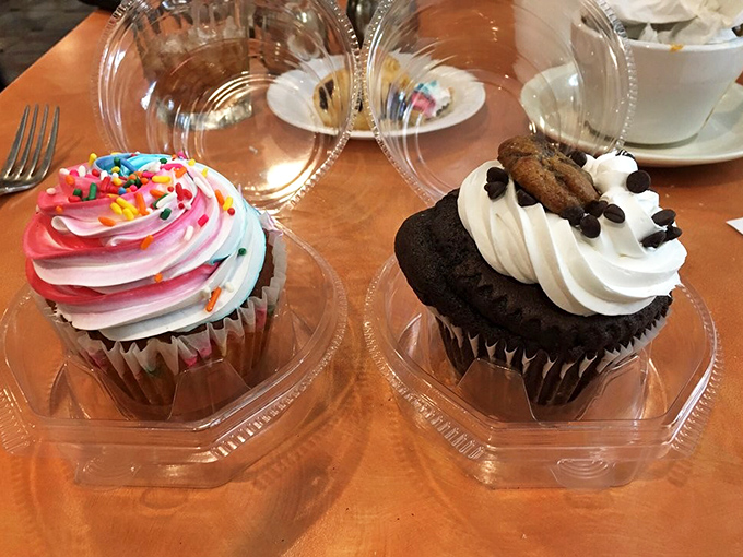 Cupcakes in their natural habitat&mdash;plastic containers that can barely contain their frosted exuberance. Happiness, now available in two flavors.