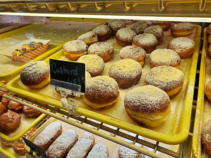 Custard-filled donuts dusted with powdered sugar &ndash; the kind that make you not care about the white evidence left on your shirt afterward.