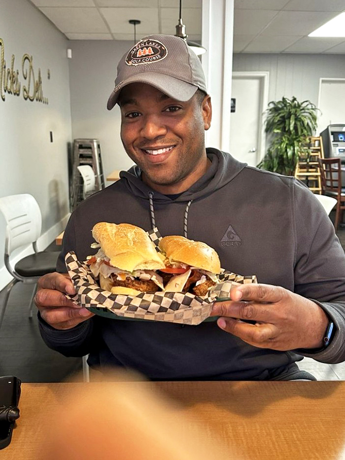The universal expression of sandwich joy. That smile says what words cannot: "I have found my people, and they make incredible food."
