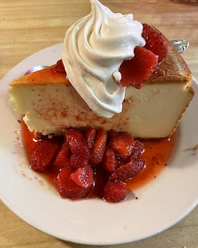 This isn't just cheesecake&mdash;it's a creamy canvas for strawberry compote and whipped cream that whispers, "There's always room for dessert."