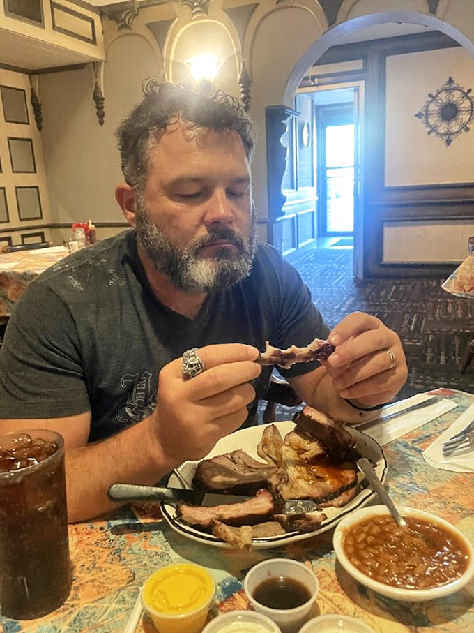 Another dining room reveals the restaurant's impressive size, with wooden chairs arranged like soldiers ready for mealtime battle.